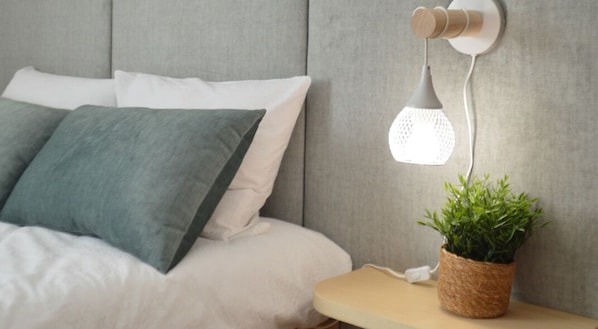 Quarto, sacada, vista para a cidade | Wi-Fi de cortesia, roupa de cama