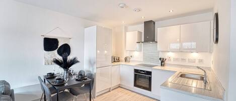 Apartamento | Cozinha privada | Uma torradeira