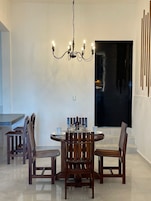 Quarto Quádruplo Deluxe, vista para a lagoa | Cozinha privada | Uma máquina de café expresso, grelhador, Produtos de limpeza