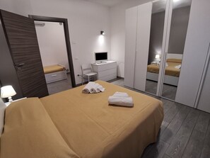 Apartamento Familiar | 1 quarto, ferro/tábua de engomar, Wi-fi grátis 