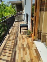 Quarto Duplo Comfort, vista para o jardim | Varanda