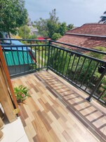 Quarto Duplo Comfort, vista para o jardim | Vista da varanda