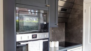 Apartamento, vista para o jardim | Cozinha privada