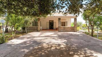 Vila standard, 4 quartos (Apartment) | Vista para o pátio