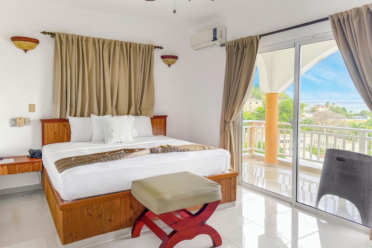 Quarto luxo, sacada, vista para a baía | Parte interna