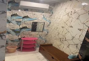 Quarto duplo luxo | Área de estar