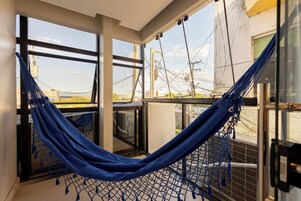 Quarto casal superior, 1 cama King | Terraço/pátio