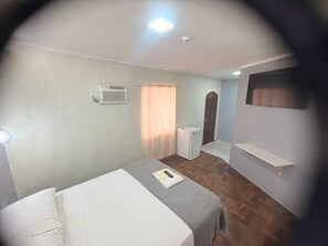 Suíte executiva | 1 quarto, espaço de trabalho para notebook, Wi-Fi de cortesia