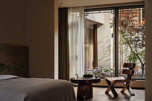 Quarto duplo elite, vista para o jardim | Vista para o jardim