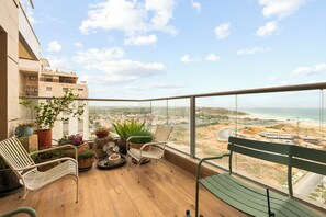 Apartamento, vista para a praia | Varanda