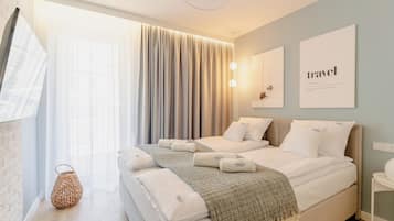 Apartamento, kitchenette, vista para o pátio | 1 quarto, ferro/tábua de engomar, Wi-fi grátis
