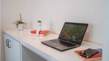 Apartamento conforto, sacada | Área de estar