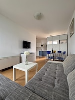 Apartamento, vista para o mar | Sala de estar