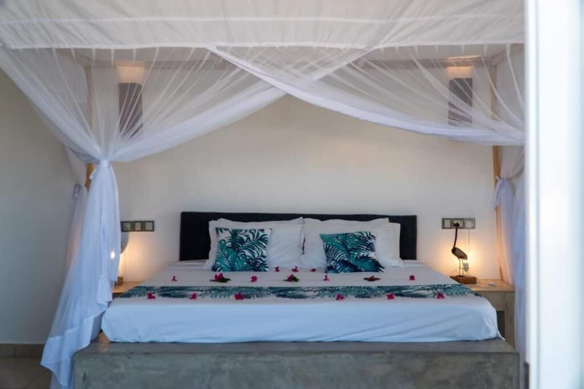 Quarto família, vista para o mar