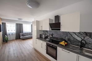 Apartamento superior | Cozinha privada | Geladeira grande, micro-ondas, máquina de café expresso
