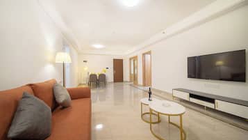 Apartamento superluxo, vista para a cidade | Área de estar