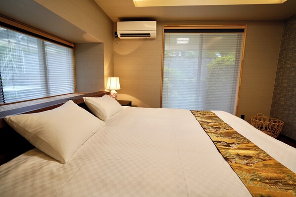 Vila família, vista para o jardim | Cortinas blackout, ferros/tábuas de passar roupa, Wi-Fi de cortesia