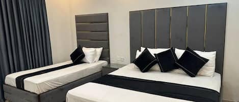 Quarto Triplo Deluxe | Secretária, Wi-fi grátis