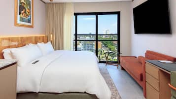 Quarto Deluxe, Vista para a cidade | Roupa de alta qualidade, edredões de penas, camas de colchão pillowtop