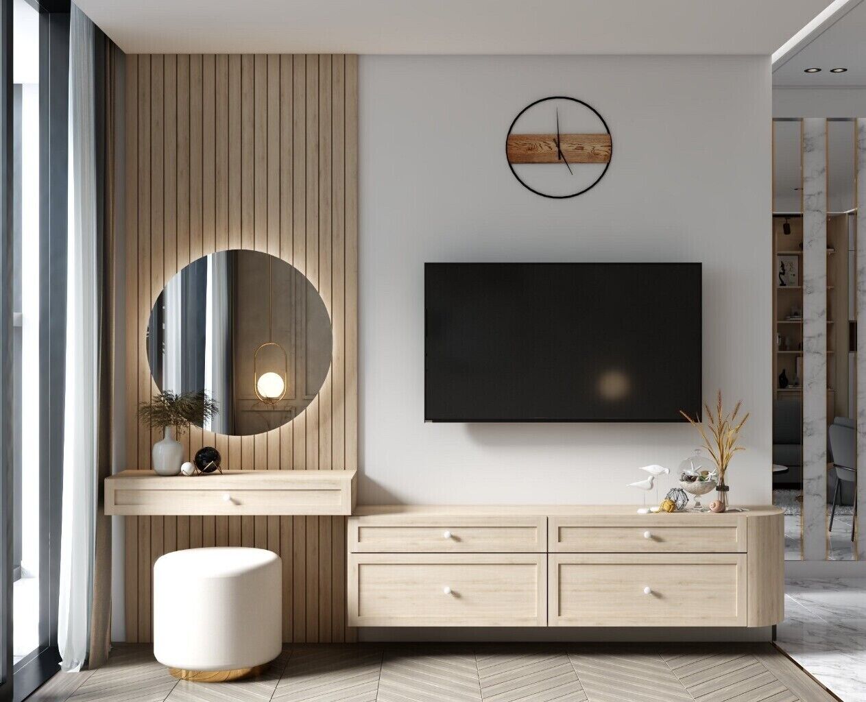 Uma casa de banho moderna com toucador de madeira, espelho redondo, televisão na parede e design minimalista.