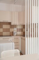 Apartamento, varanda, Vista para a cidade | Kitchenette privada