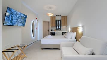 Estúdio superior, vista para a piscina | Área de estar