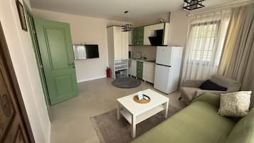 Dúplex Comfort, varanda, vista para o jardim | Sala de estar