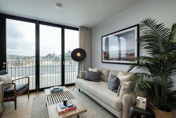 Apartamento, 1 cama king-size | Sala de estar