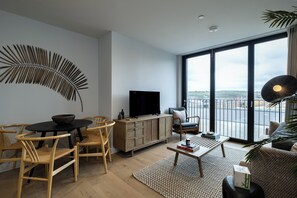 Apartamento, 1 cama king-size | Sala de estar