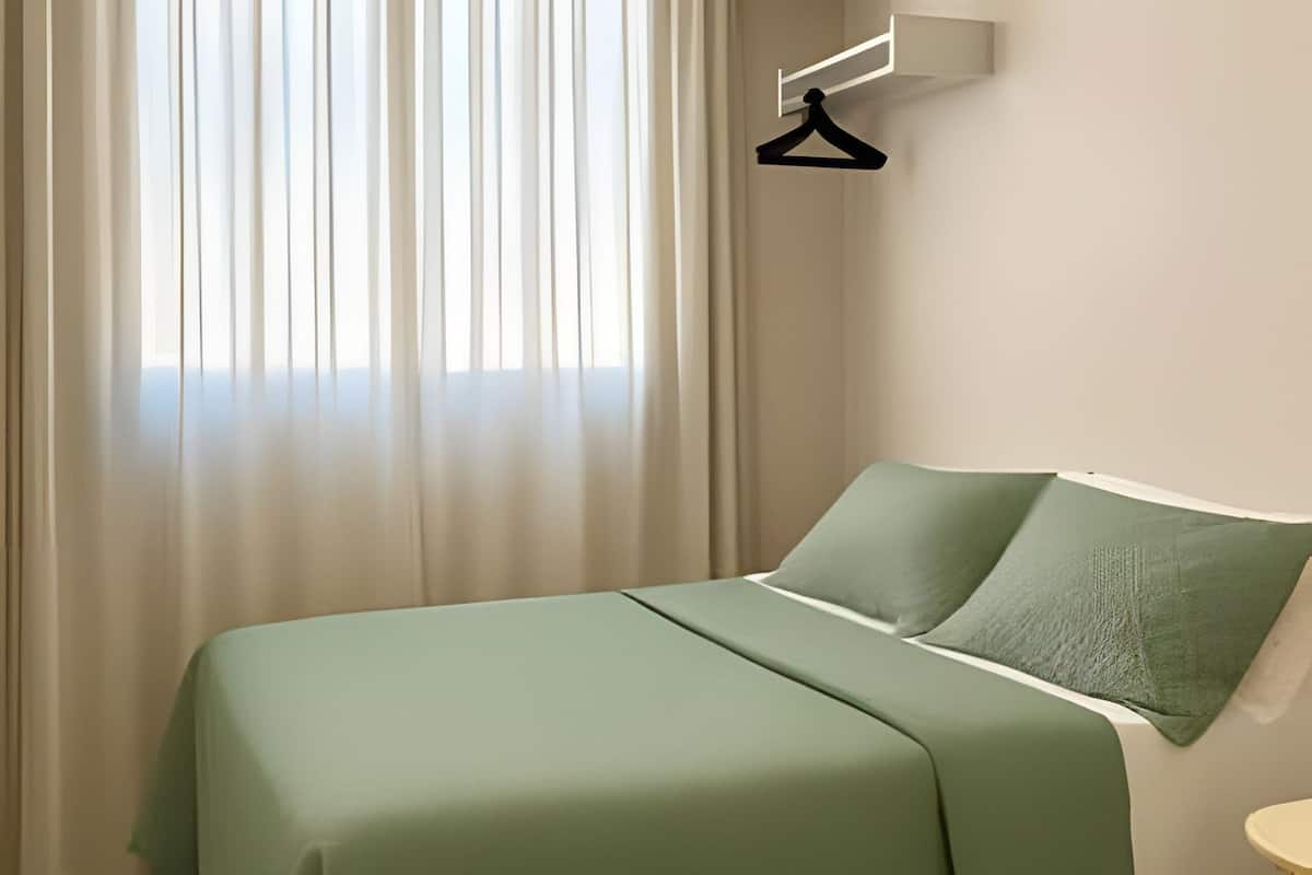 Apartamento | Cortinas/cortinados opacos, ferro/tábua de engomar, Wi-fi grátis