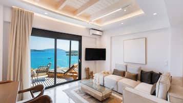 Duplex superluxo, vista para o mar | Área de estar | TV 50 polegadas com canais digitais