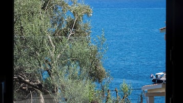 Apartamento superluxo, vista para o mar, ao lado da piscina | Terraço/pátio