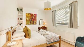 Casa | Roupa de alta qualidade, ferro/tábua de engomar, Wi-fi grátis