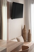 Suite-Estúdio Deluxe, 1 cama king-size | Ferro/tábua de engomar, Wi-fi grátis 