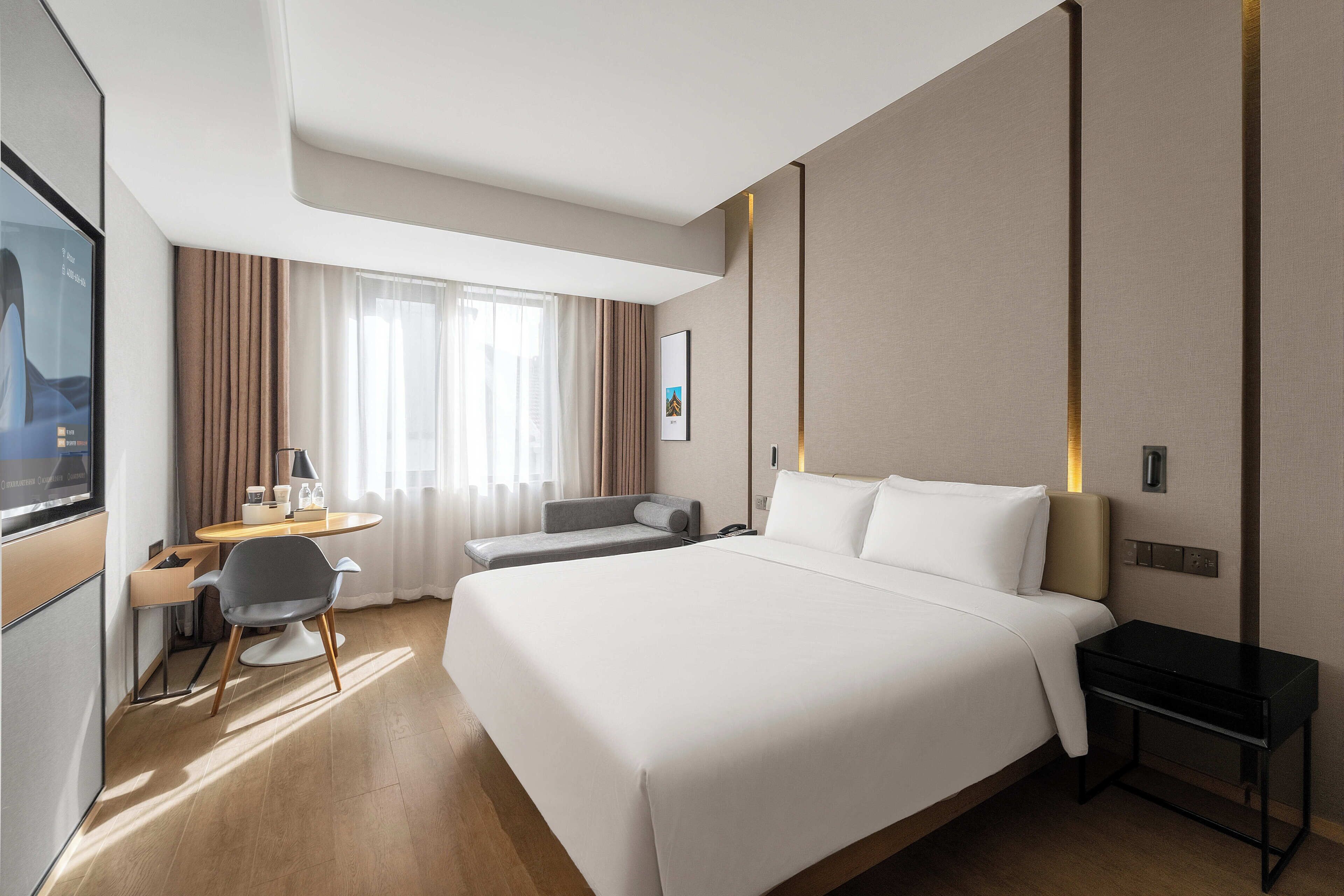 Quarto Duplo, Vista para a cidade | Roupa de alta qualidade, edredões de penas, minibar grátis 