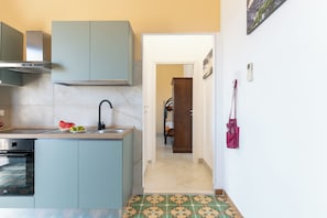 Apartamento luxo, vista para o mar | Cozinha privada | Máquina de café expresso