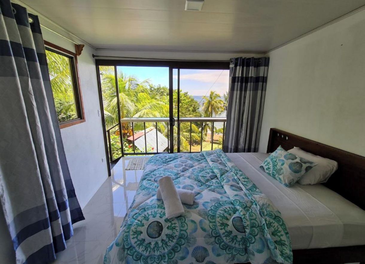 Quarto casal standard, sacada, vista para o oceano | Wi-Fi de cortesia, roupa de cama