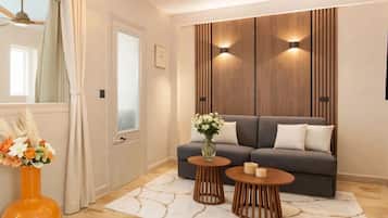 Apartamento standard, vista para o pátio | Área de estar | Smart TV 80 cm com canais digitais