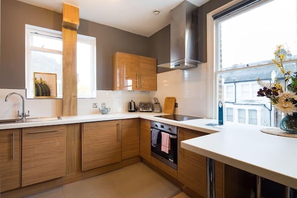 Apartamento Superior, varanda | Cozinha privada
