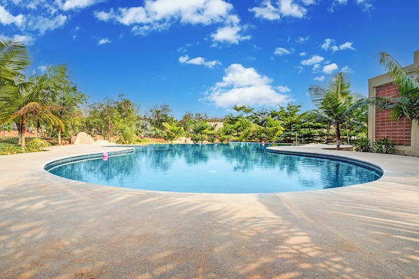 Elivaas Urvi Resort | Eco-luxury Getaway With Pool - Bengaluru