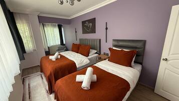 Suite Familiar | Secretária, Wi-fi grátis