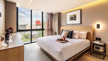 Apartamento, 2 quartos | Cofres nos quartos, Wi-Fi de cortesia, roupa de cama