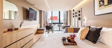 Apartamento superior | Cofres nos quartos, Wi-Fi de cortesia, roupa de cama
