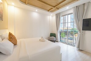 Apartamento Júnior, Vista para a cidade | Roupa de alta qualidade, camas de colchão viscoelástico, minibar 