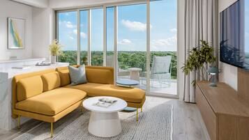 Suite Presidencial | Sala de estar | Smart TV de 65 polegadas com canais digitais, livros