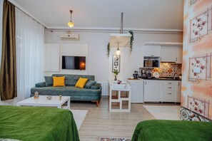 Suite-Estúdio Executiva | Secretária, ferro/tábua de engomar, berços/camas para crianças grátis