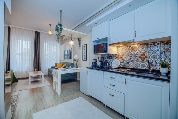 Suite-Estúdio Executiva | Secretária, ferro/tábua de engomar, berços/camas para crianças grátis