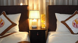 Quarto superior | Roupas de cama premium, frigobar, escrivaninha, cortinas blackout