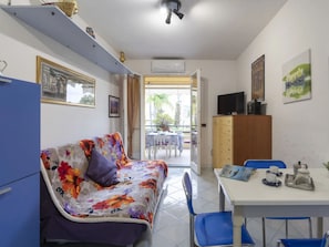 Apartamento Comfort, vista para o jardim | Sala de estar