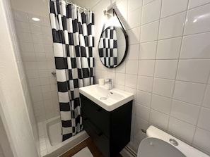 Apartamento | Casa de banho | Um secador de cabelo